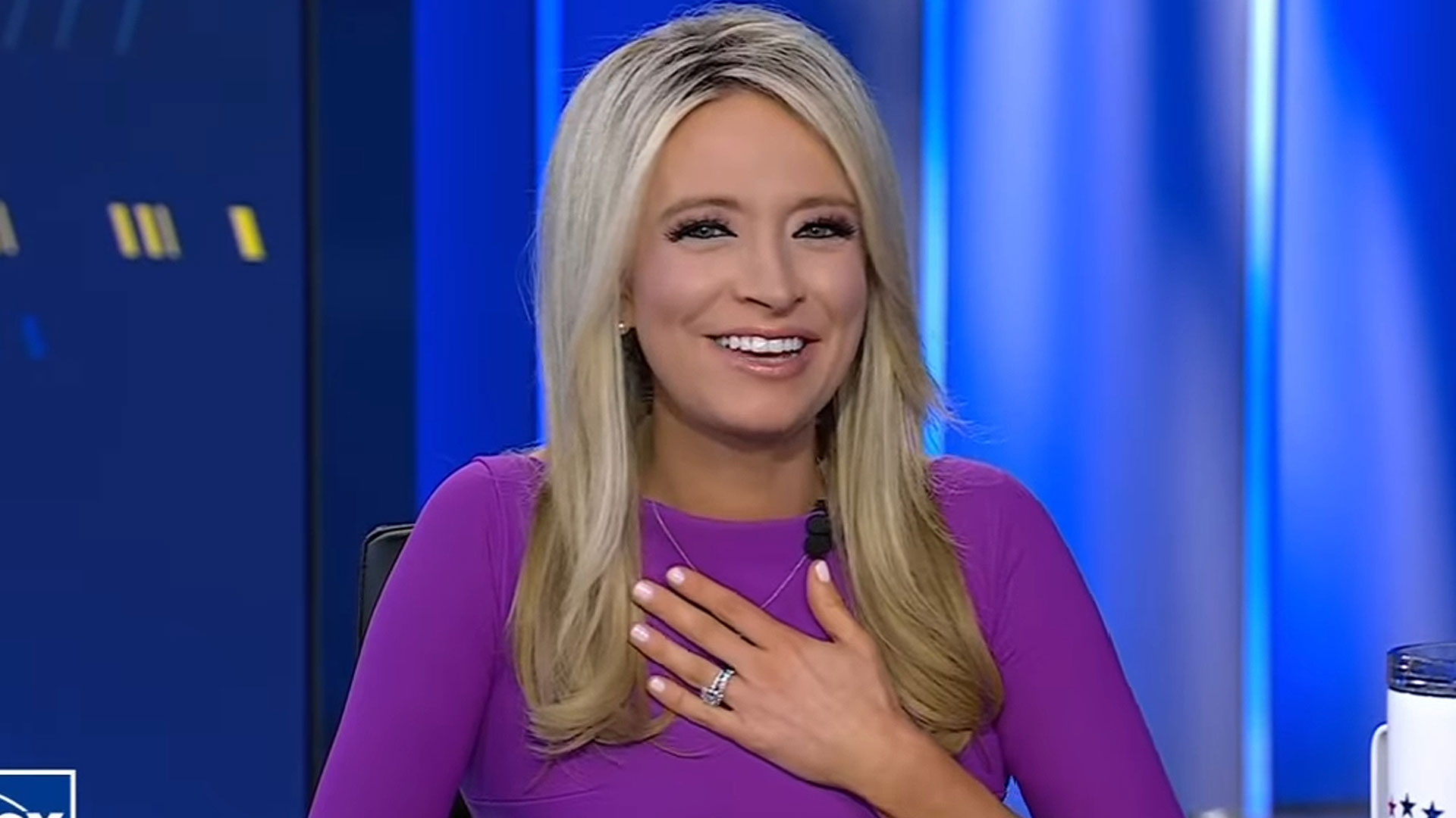 Kayleigh McEnany wiped away tears as she hinted that even her newborn child with her husband ...